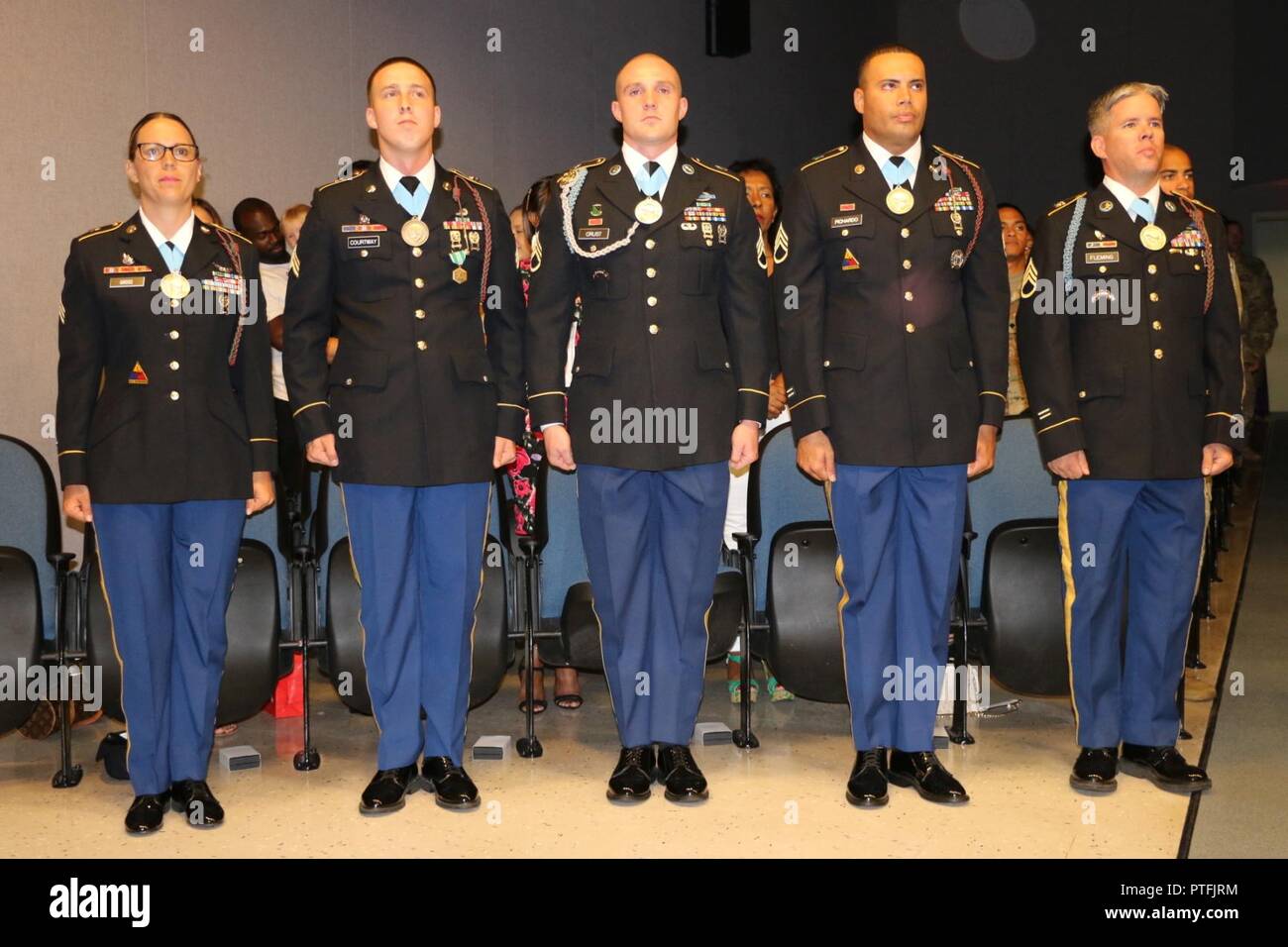 Inductees of the 3rd Infantry Division Sergeant Audie Murphy Club stand ...