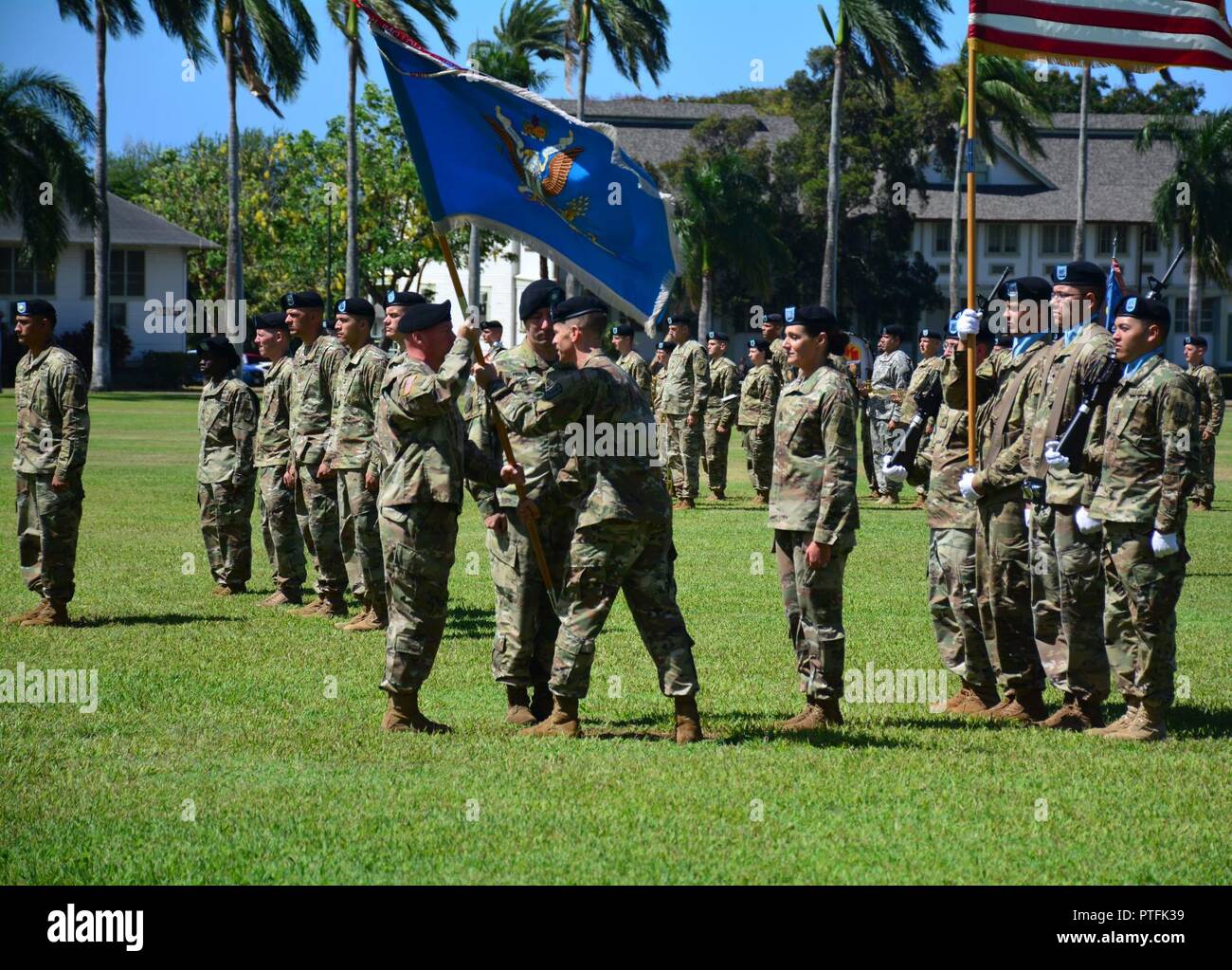 Lt. Col. James B. Cogbill passes the battalion colors in a change of ...