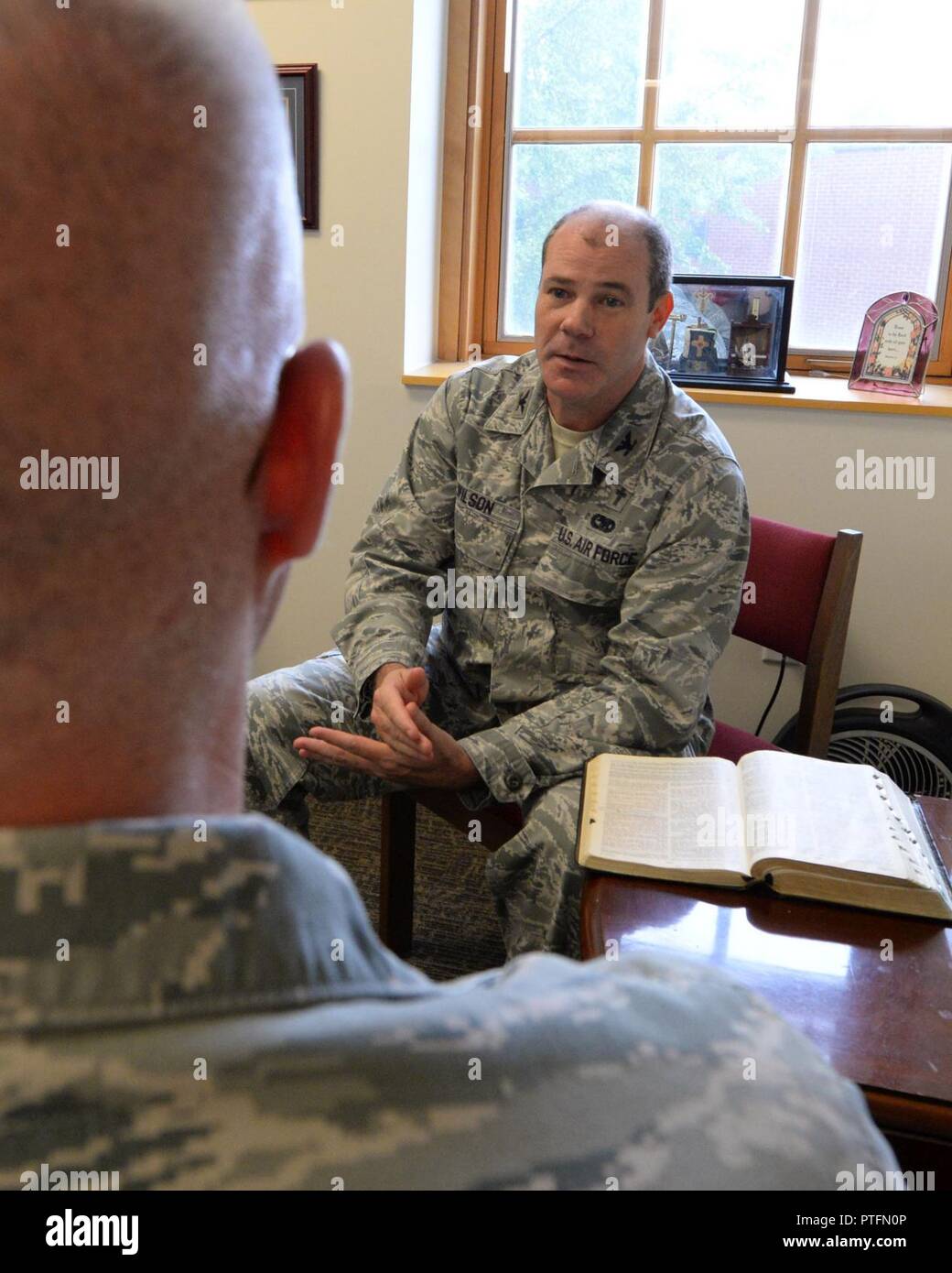 U.S. Air Force, Col. Ted Wilson, 88th Air Base Wing chaplain, provides ...