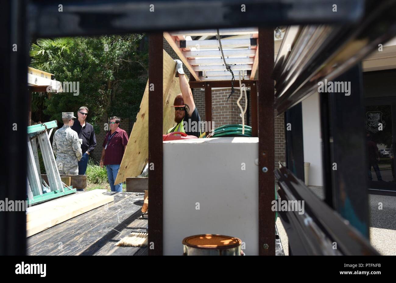 Colton Freeman, Base Operations Support carpenter, loads boarding ...