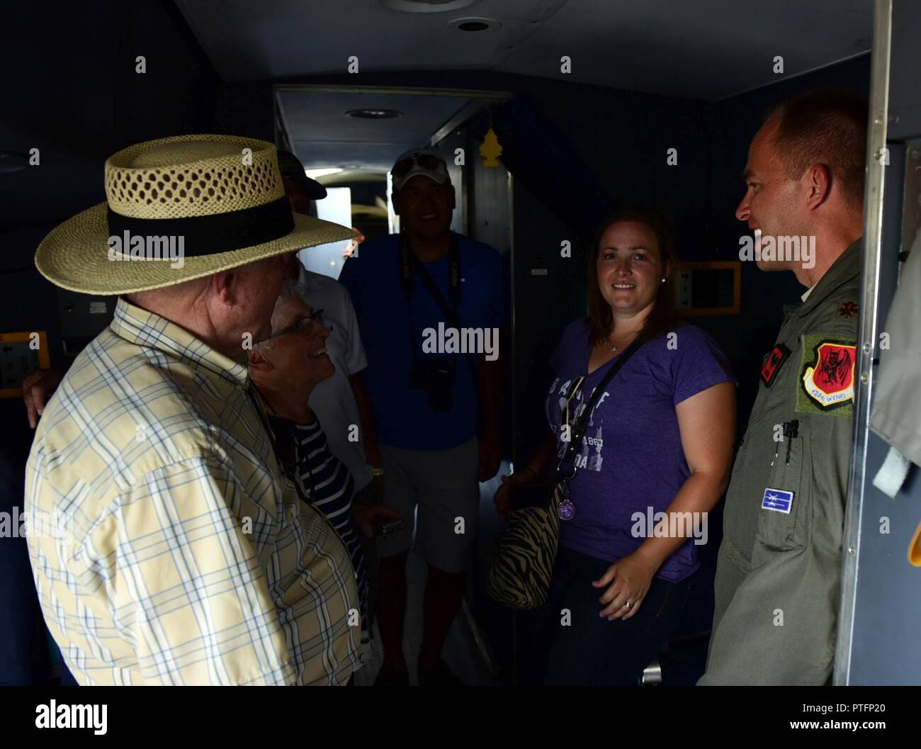 Maj. Richard, 432nd Wing MQ-1 Predator pilot, shows his family around a ...