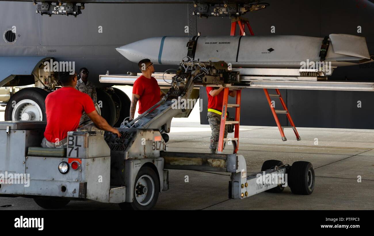 Members of the 96th Aircraft Maintenance Unit upload a joint air-to ...