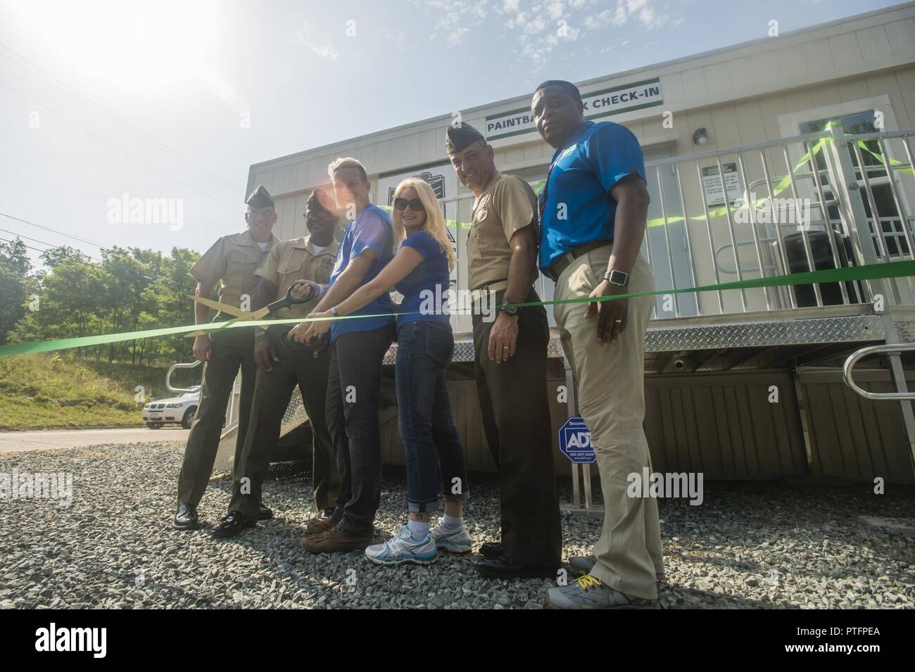 From left, U.S. Marines Col. John B. Atkinson, commanding officer ...