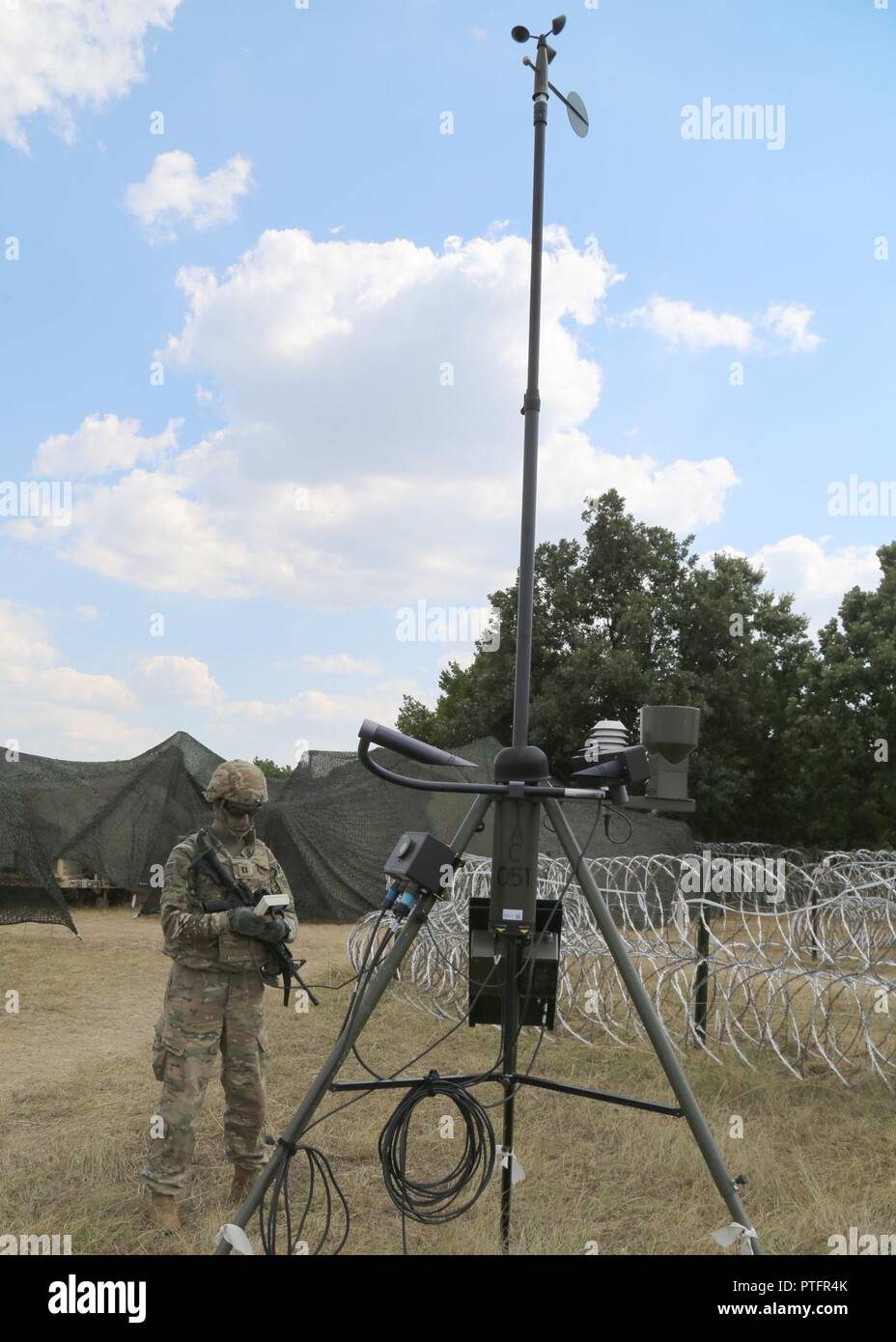 Air Force Capt. Ben Wood, assigned to the 7th Expeditionary Weather ...