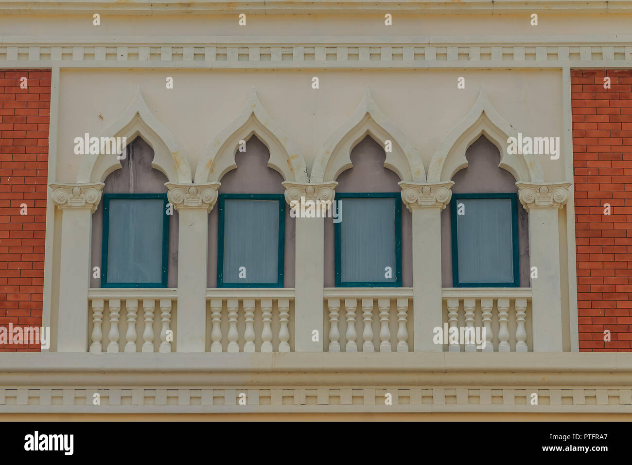 Row of arch windows on the balcony with stucco wall background Stock ...
