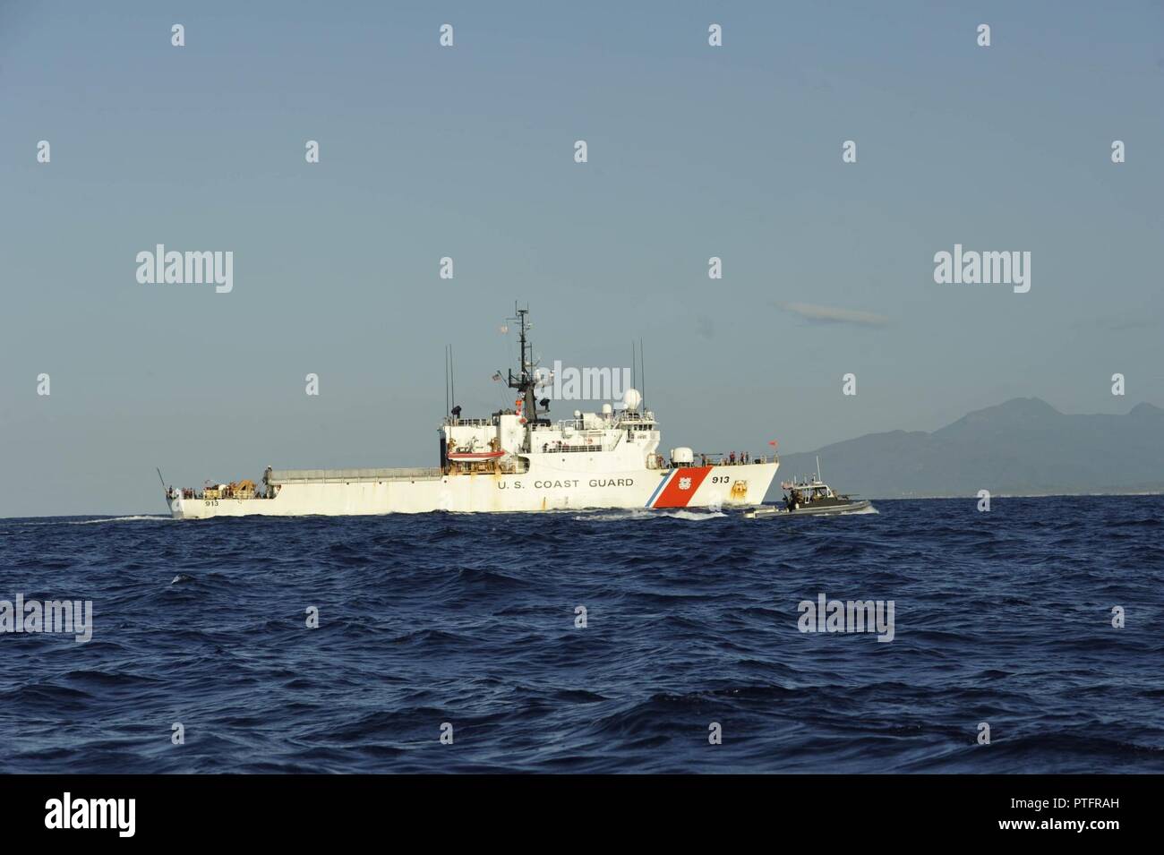 Coast Guardsmen from Port Security Unit 305 aboard a 32-foot ...
