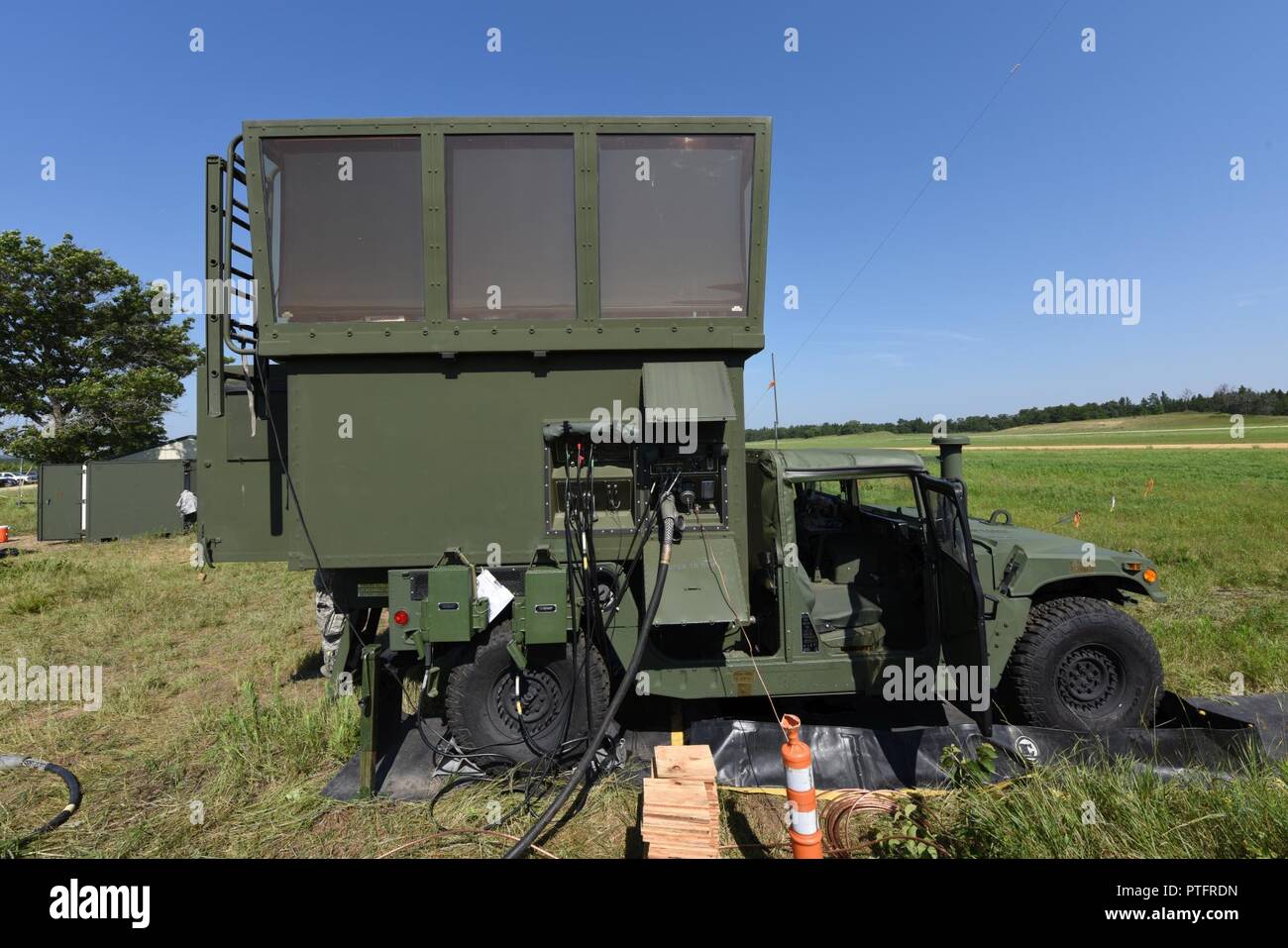 The MSN-7 mobile air traffic control tower is deployed from a Humvee ...