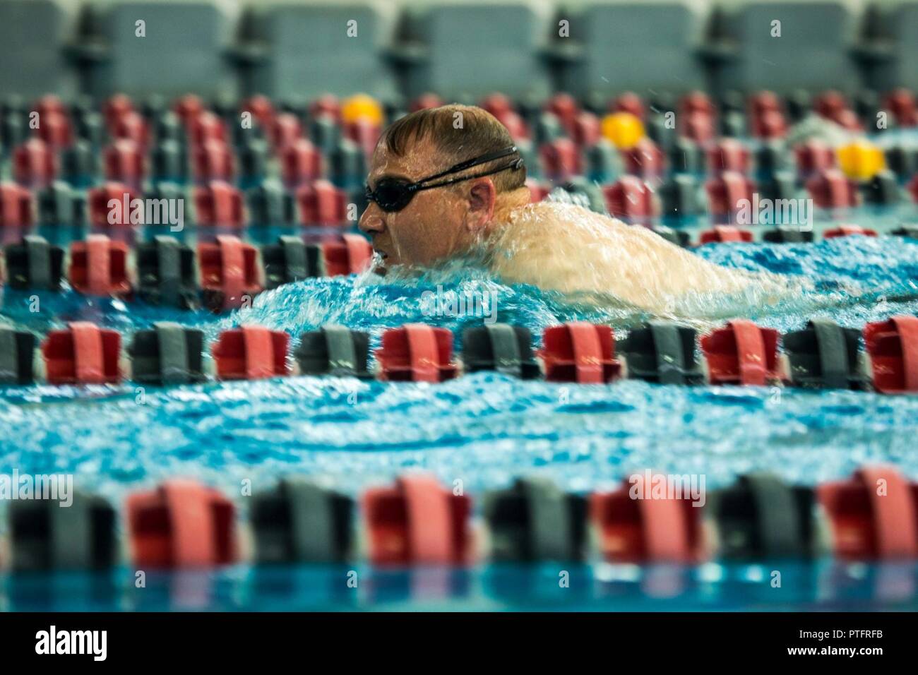 U.S. Army Col. Daniel Dudek competes in a swimming event at the 2017 ...