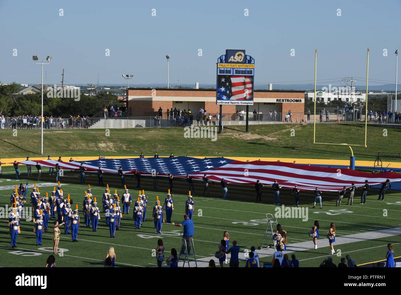 Angelo State University ROTC students unfold the American flag during ...