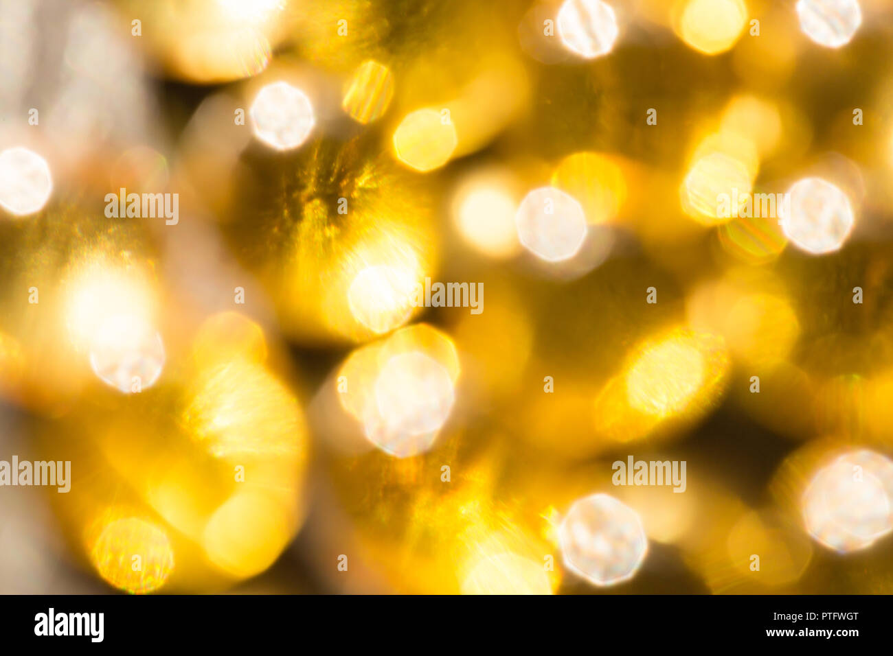 Defocused yellow golden lights. Festive bright background Stock Photo ...