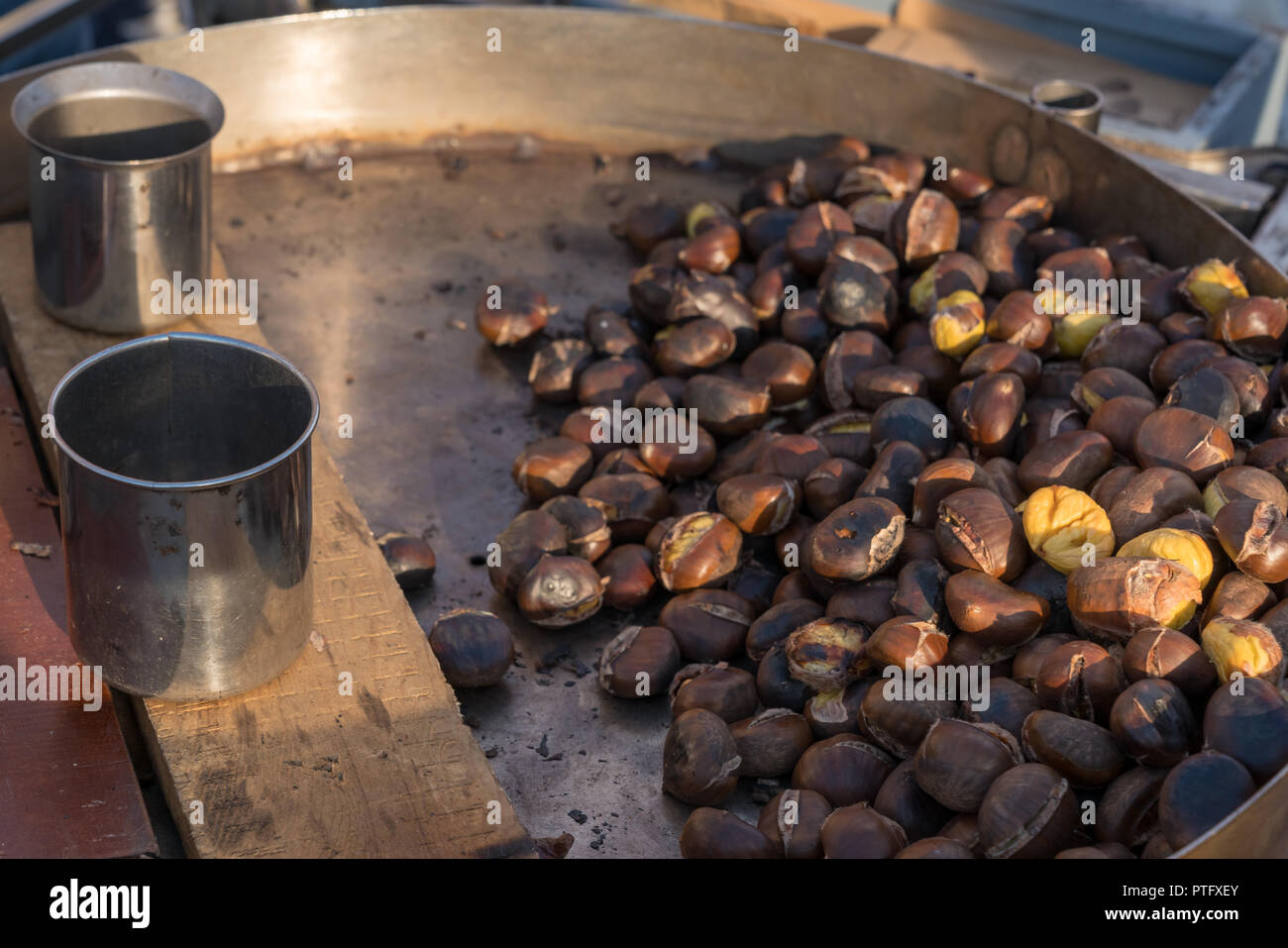 Roast chestnuts cooked over the red-hot grill,"Caldarroste", roasted ...