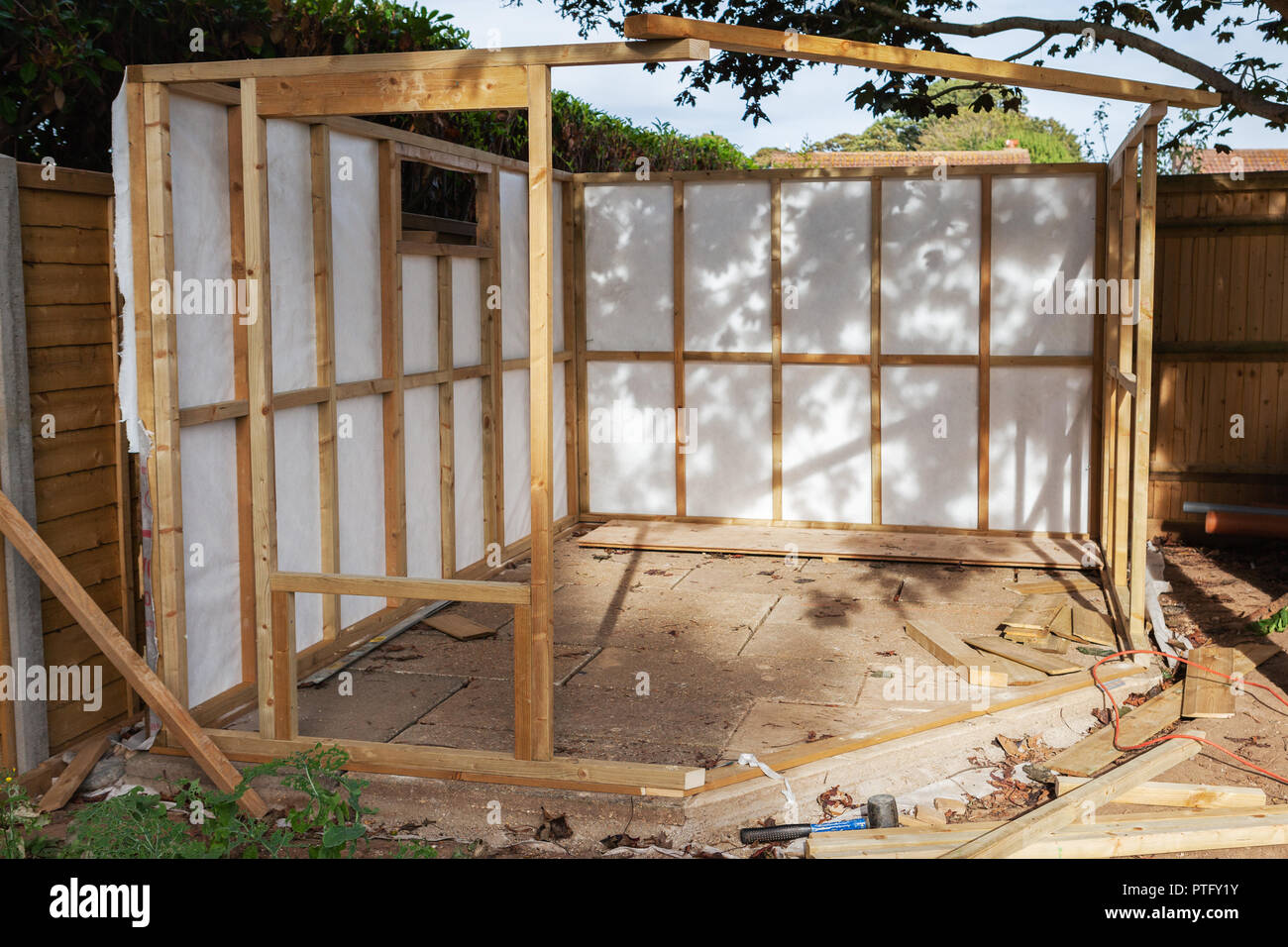 Building summer house or shed in the garden, unfinished structure made ...