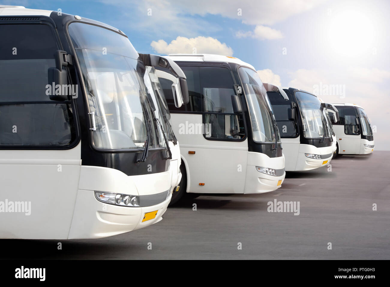 big tourist buses on parking Stock Photo - Alamy