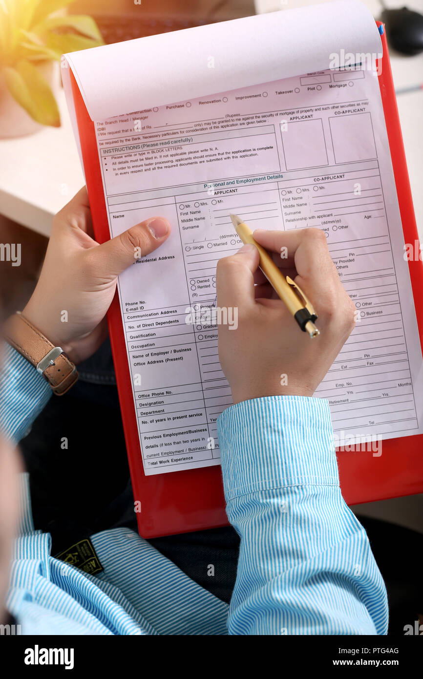 Hand holding sheet of paper hi-res stock photography and images - Alamy