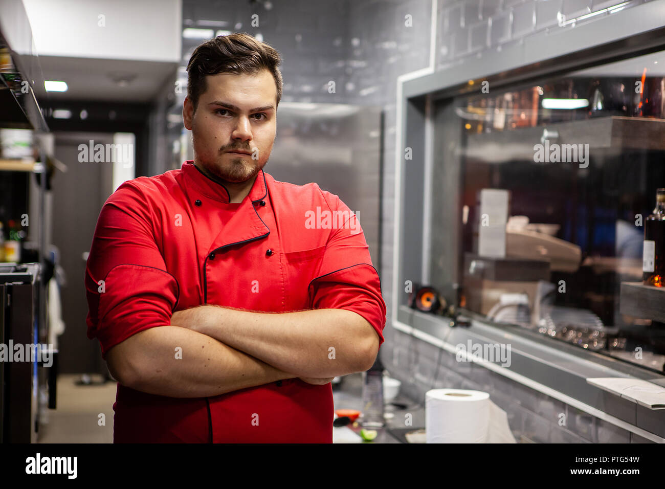 Male chef cook in red hi-res stock photography and images - Alamy