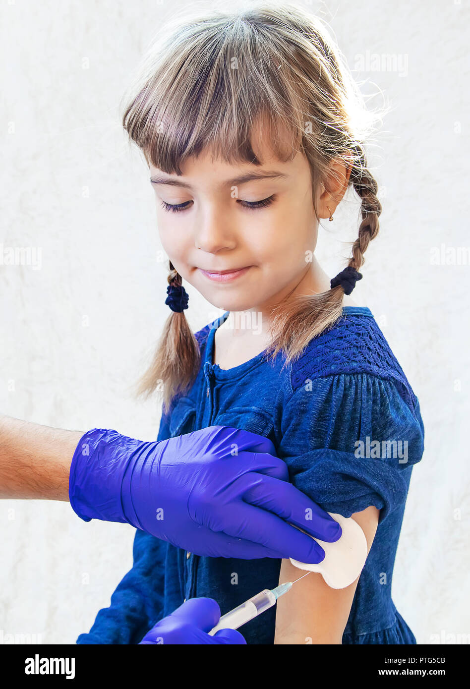 vaccination of children. An injection. Selective focus kids Stock Photo ...