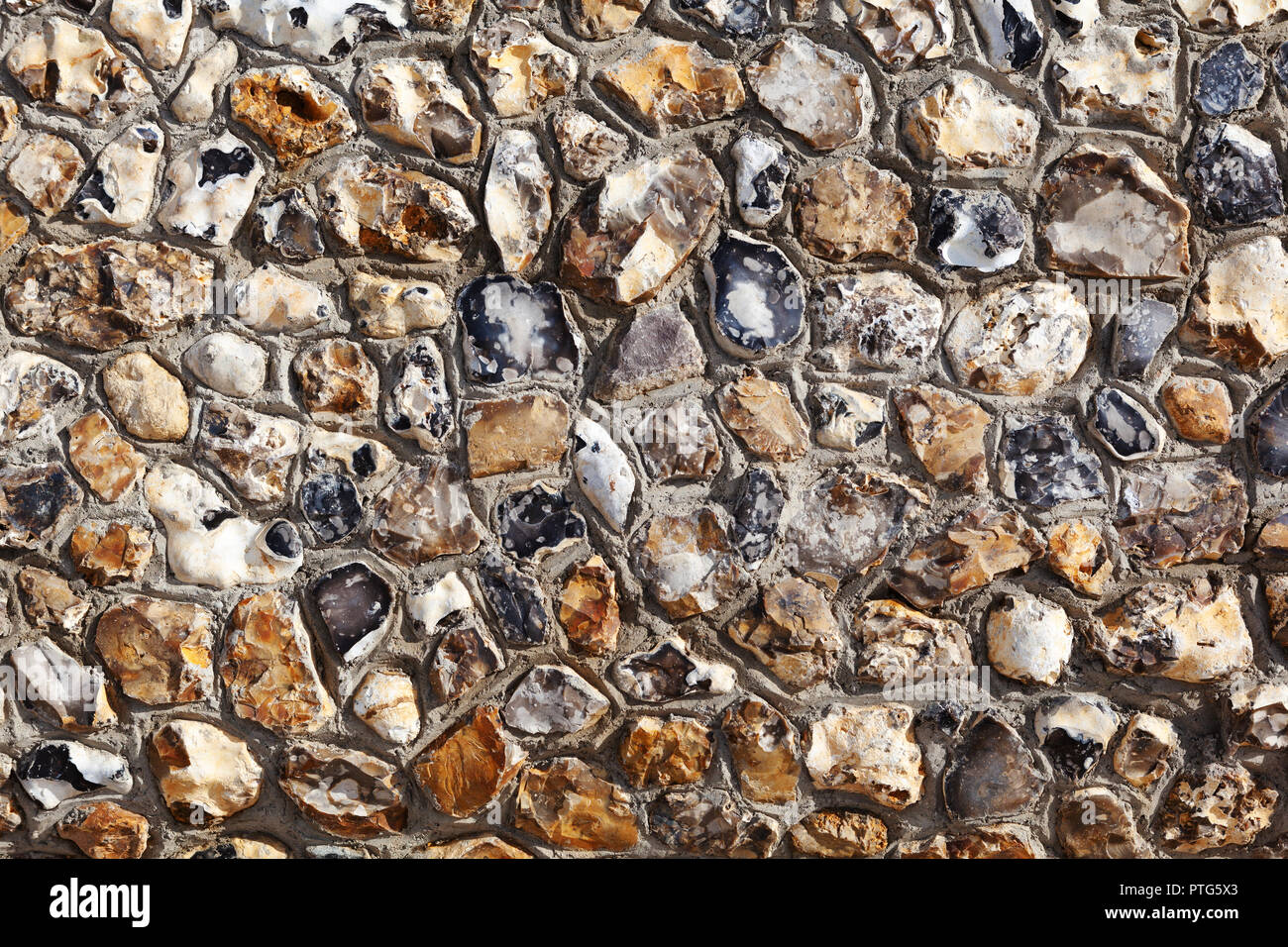 Stone wall background on Brighton beach, England, UK Stock Photo - Alamy