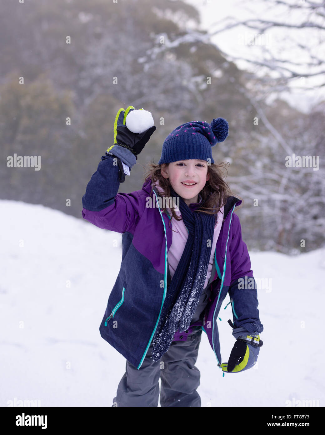 Snowball child throwing hi-res stock photography and images - Alamy