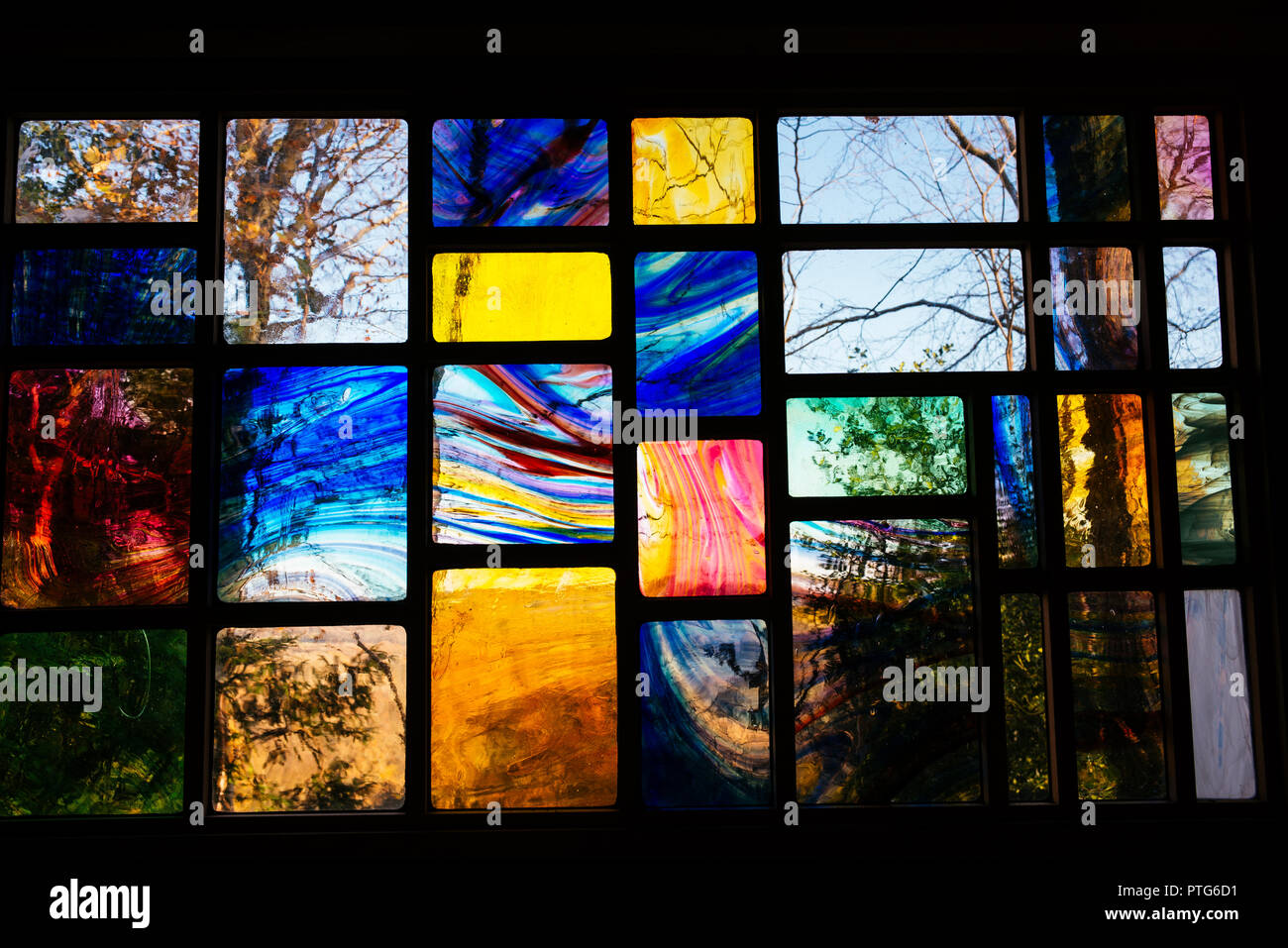 View through contemporary stained glass window Stock Photo - Alamy