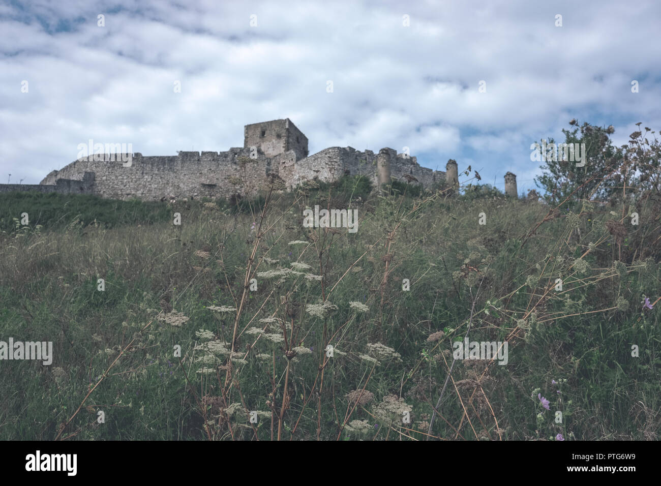 ruins of old abandoned castle on the cliff with bricks and stone ...