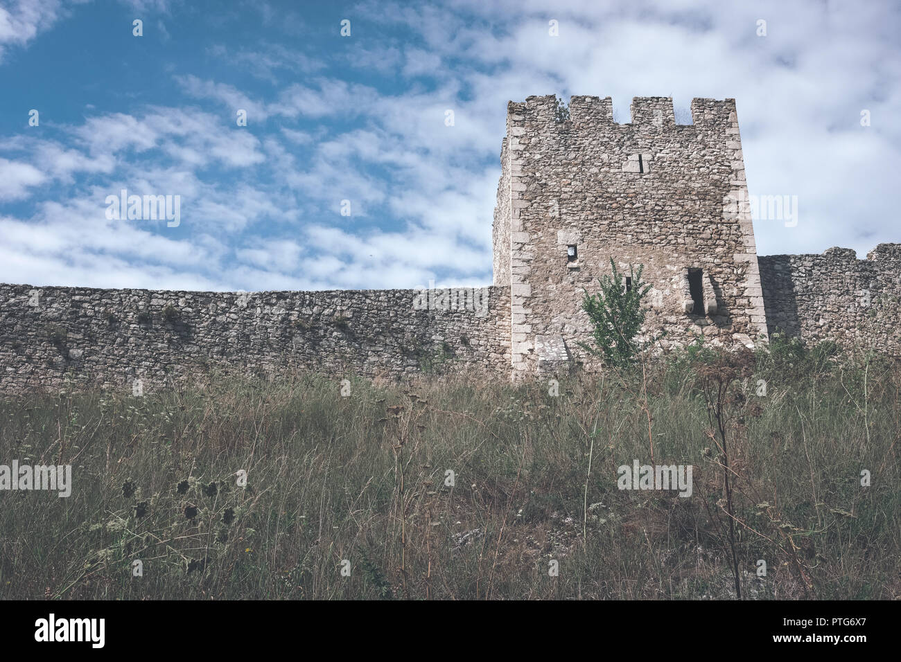 ruins of old abandoned castle on the cliff with bricks and stone ...