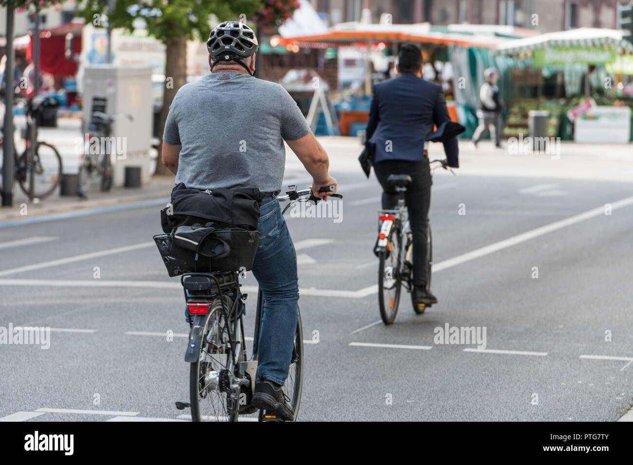 cyclists in the city Stock Photo - Alamy
