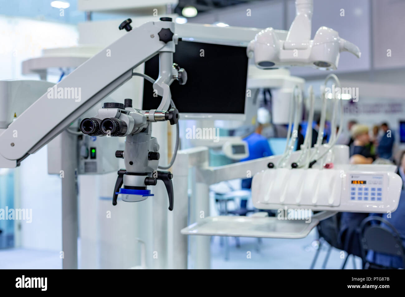 Dental microscope on the background of modern dentistry. Medical ...