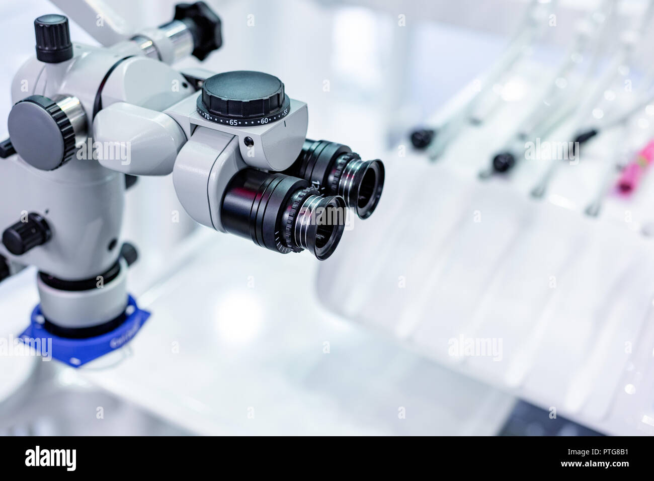 Dental microscope on the background of modern dentistry. Medical ...