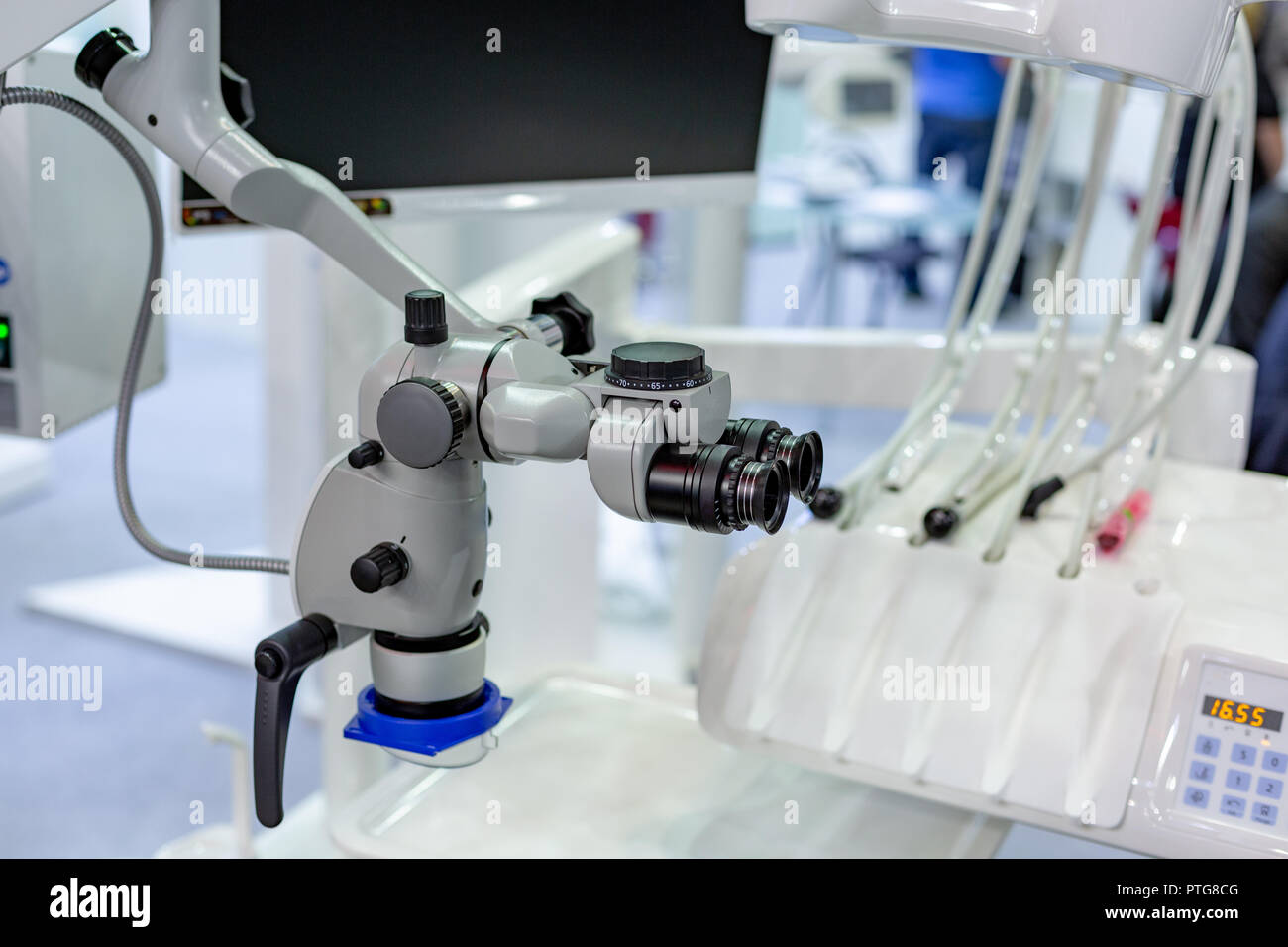 Dental microscope on the background of modern dentistry. Medical ...