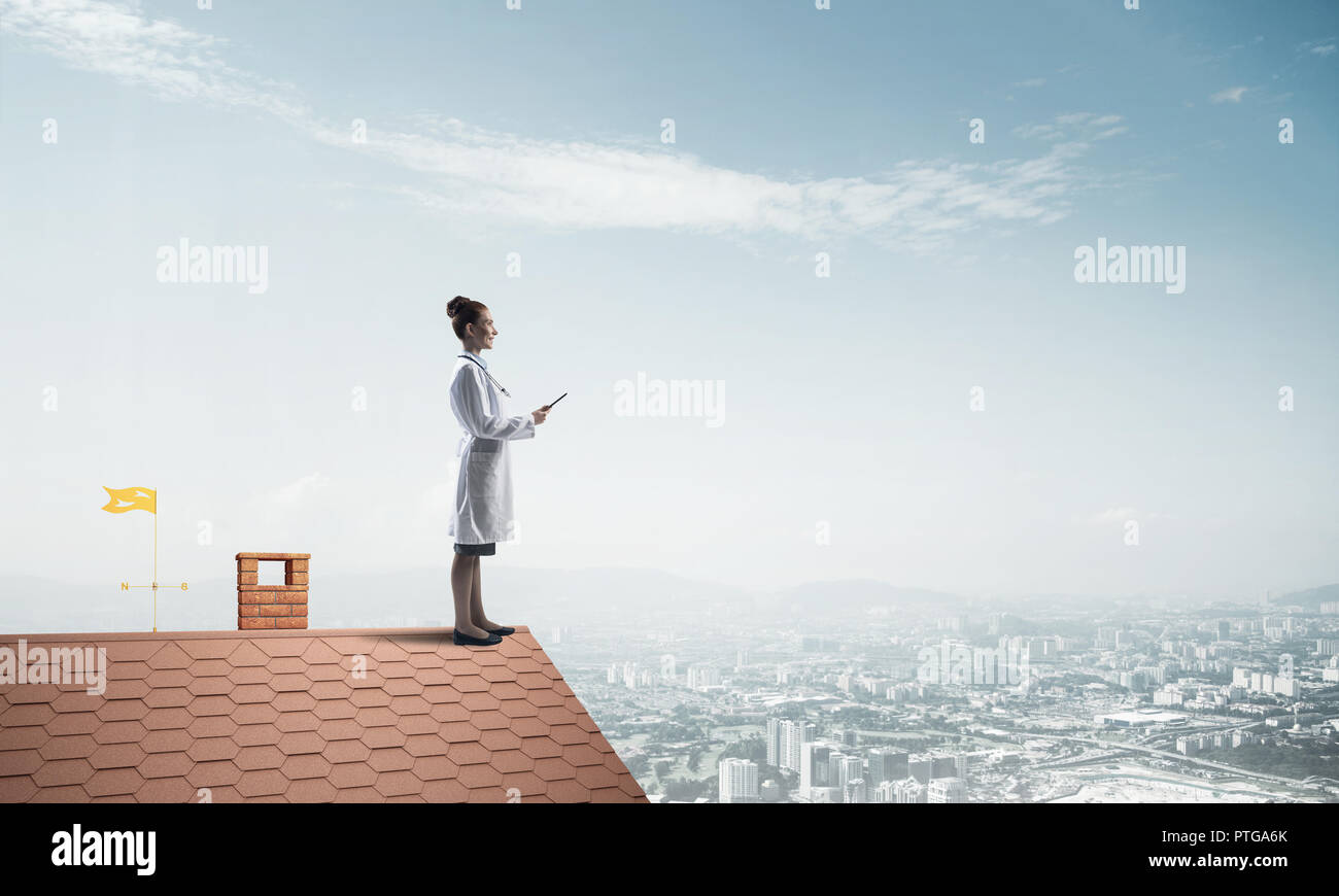 Woman doctor is ready to help the whole city Stock Photo - Alamy