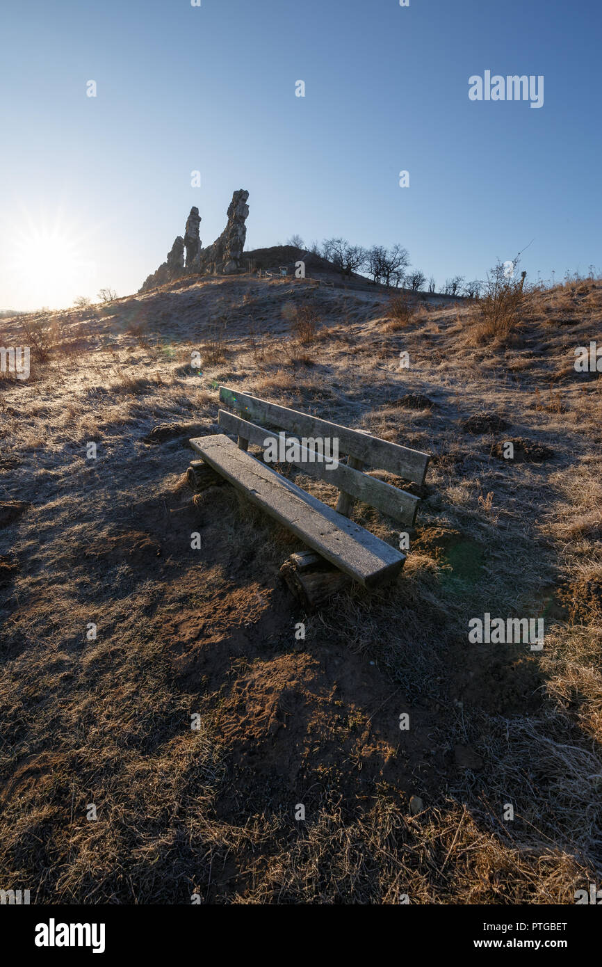 Bench seat in front of the devil's wall, with sunshine and blue sky ...