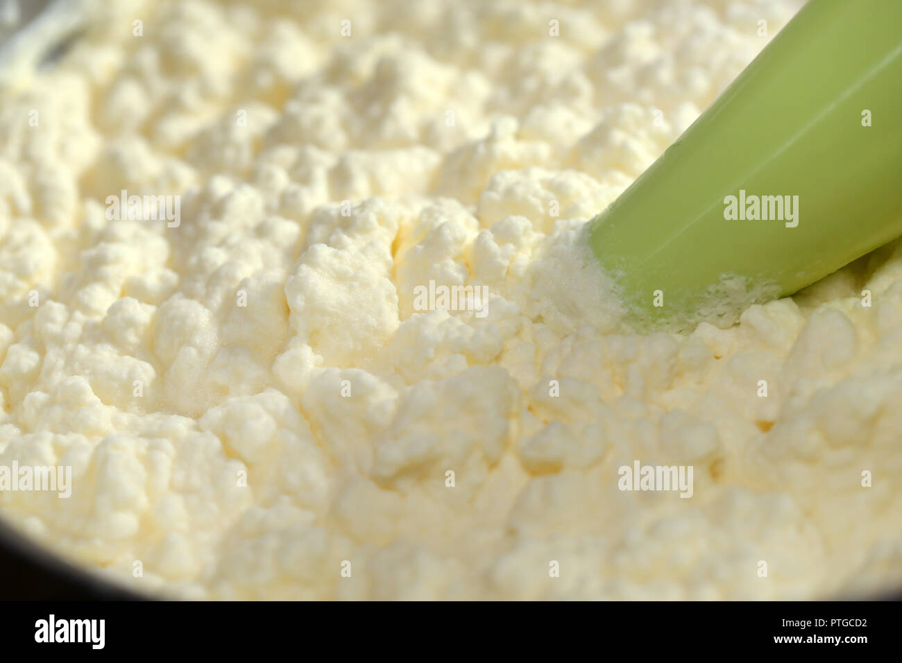 Butter extraction from milk homemade Stock Photo - Alamy