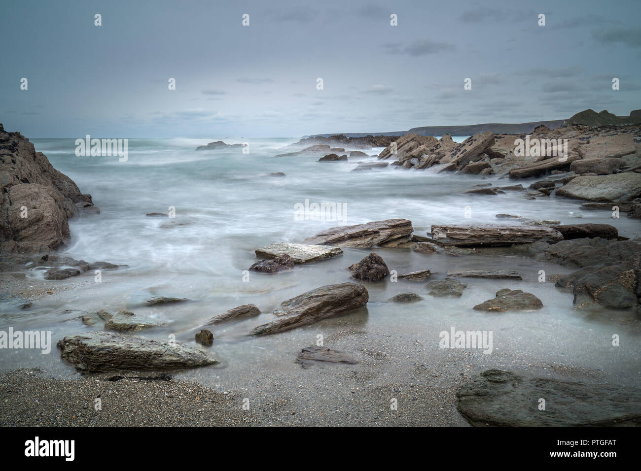 Waves over Rocks, Porth Beach, Cornwall Stock Photo - Alamy