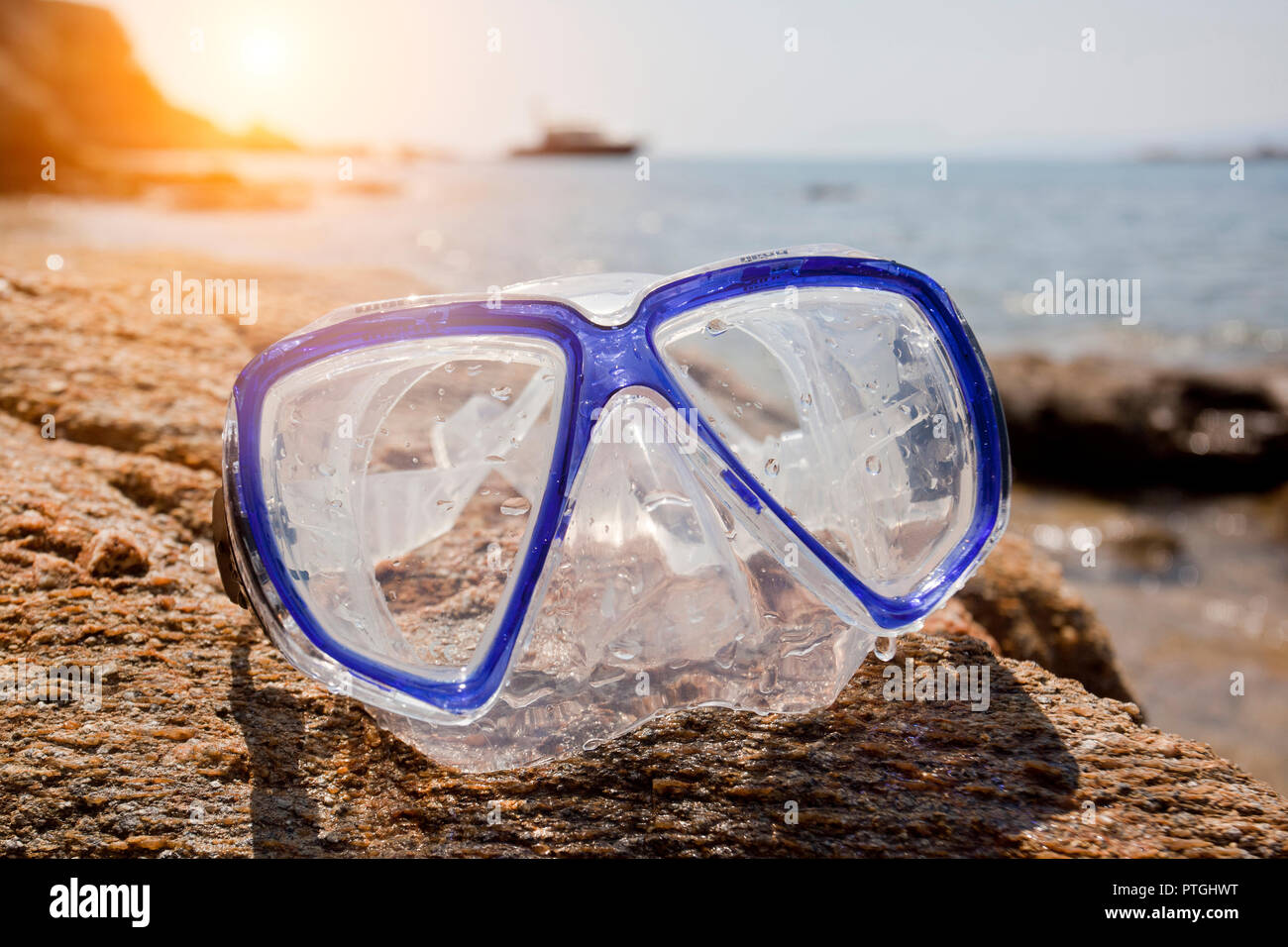 diving masks at the beach splashed by waves Stock Photo - Alamy
