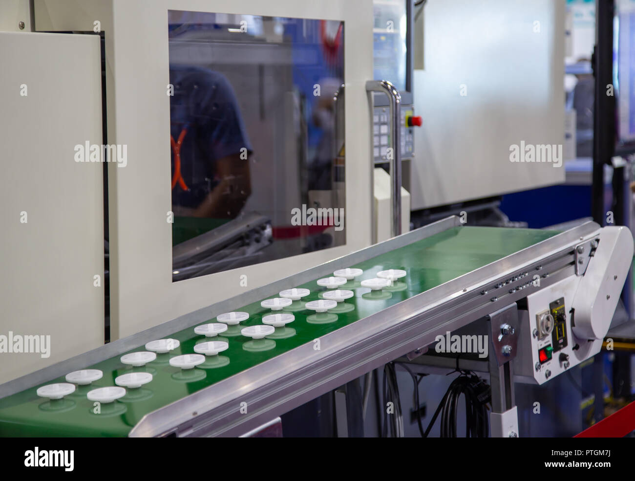 Product of plastic gears from electric injection molding machine Stock ...