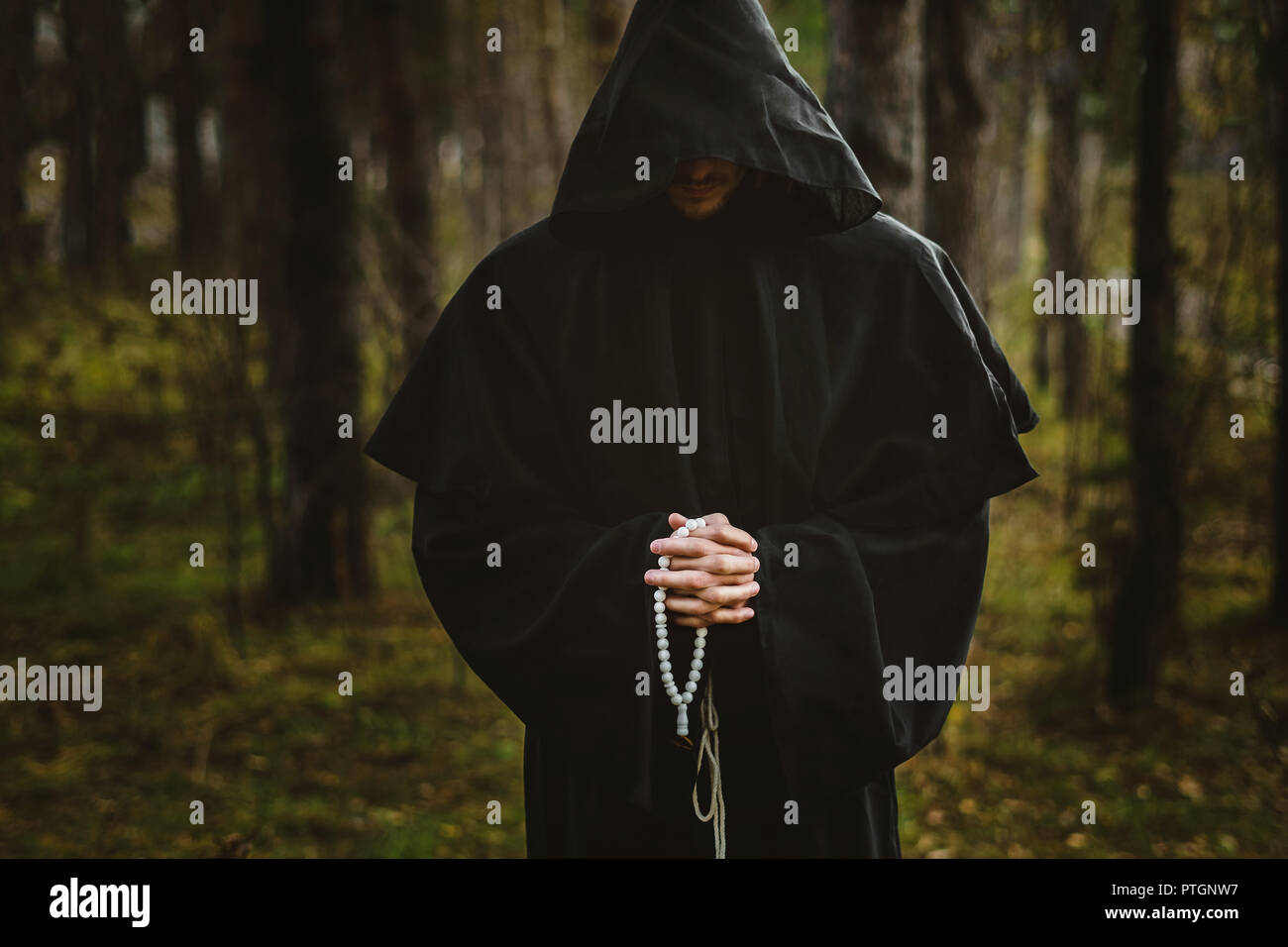 Man In Hooded Cloak