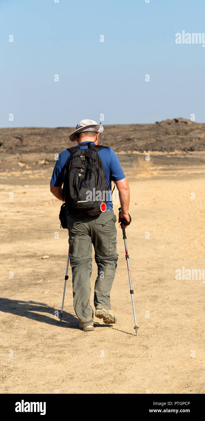 in danakil ethiopia africa the old backpacker people walking in the ...
