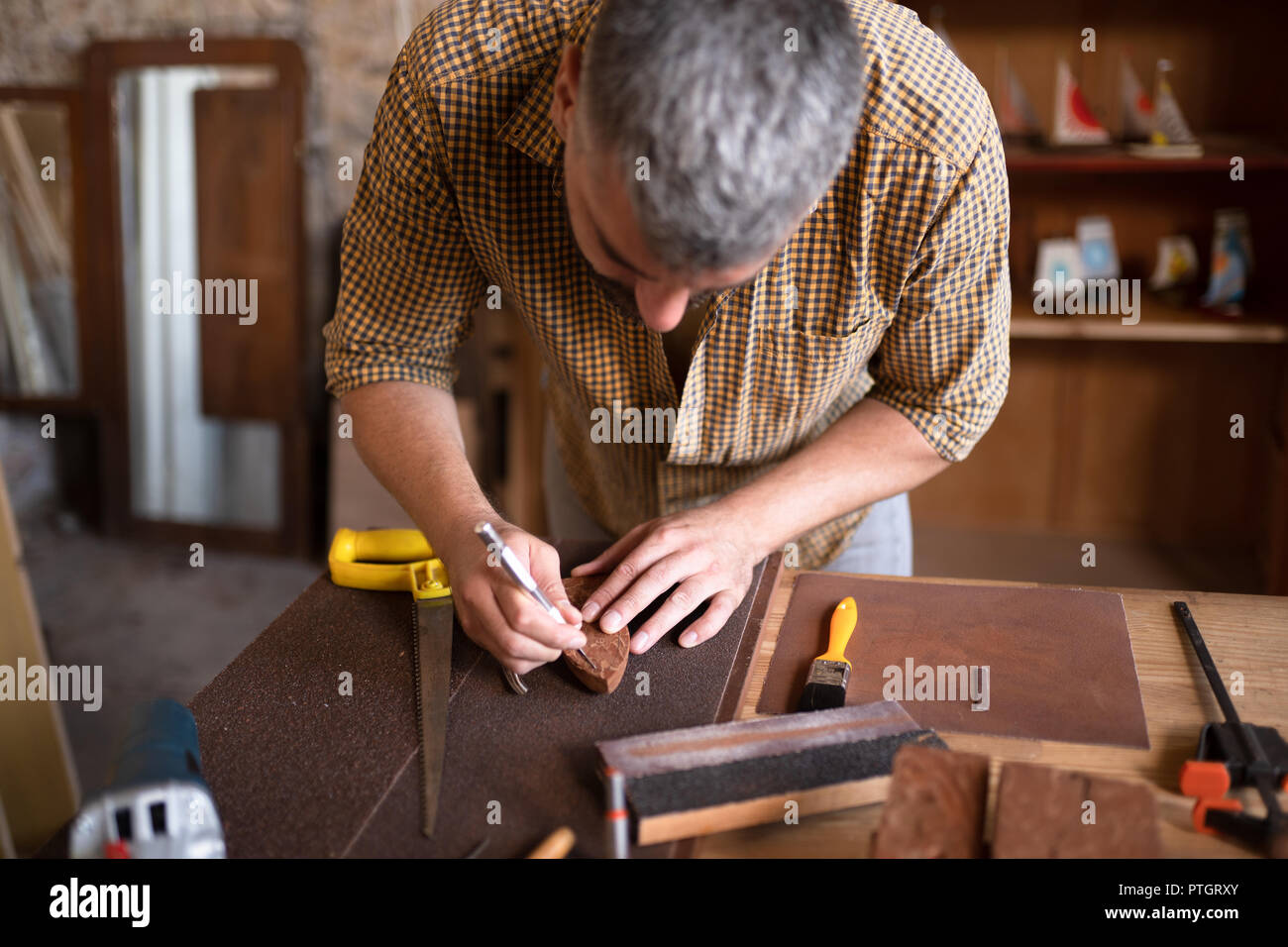 Male using wood chisel hi-res stock photography and images - Alamy