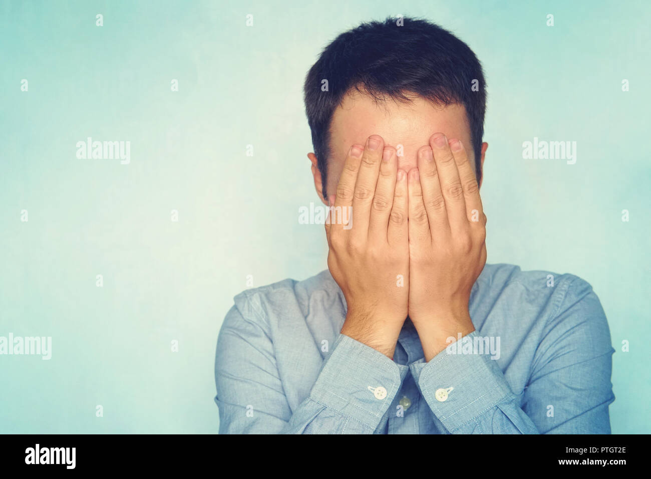 Hands over face image hi-res stock photography and images - Alamy