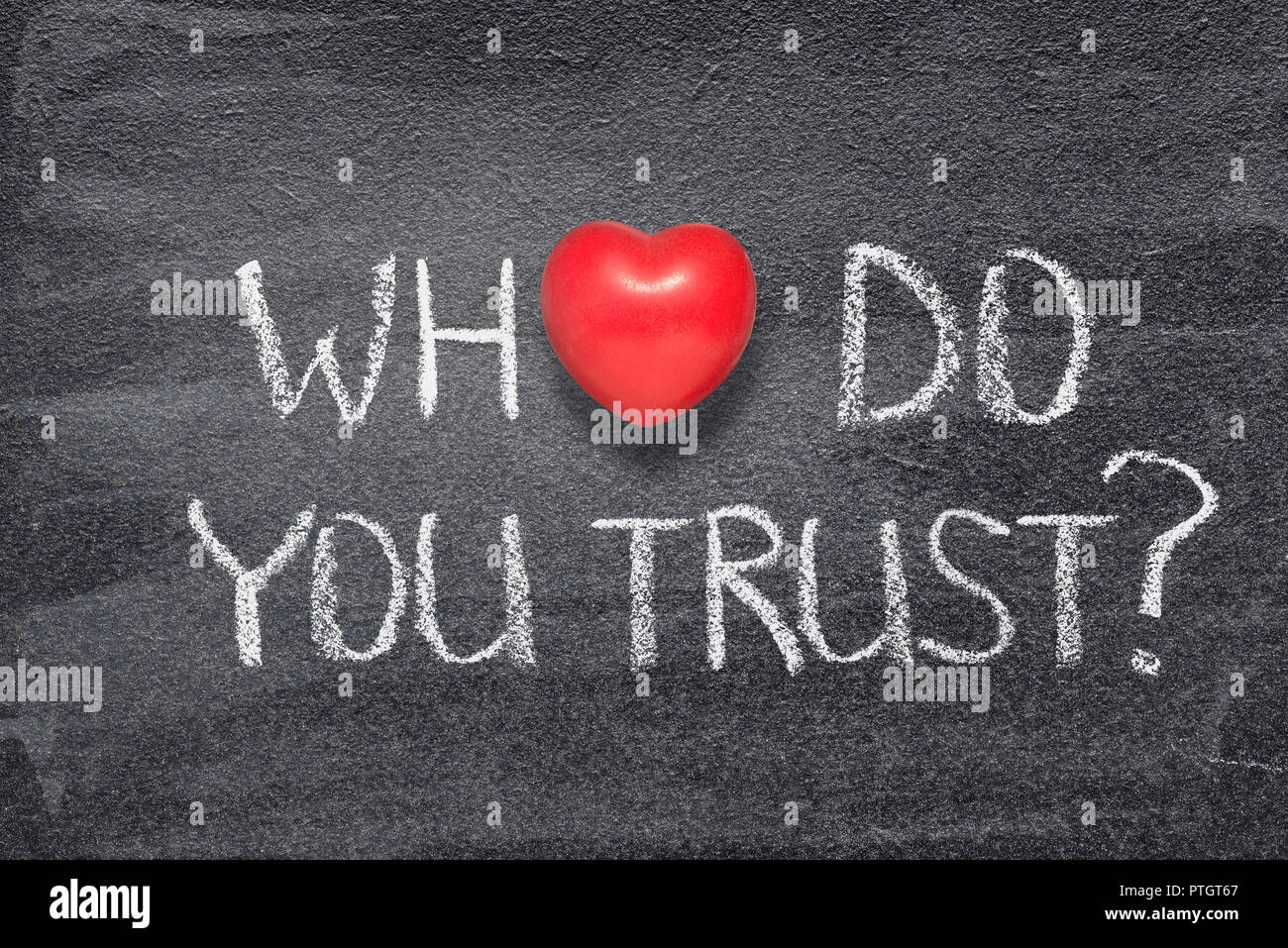 who do you trust question handwritten on chalkboard with red heart ...