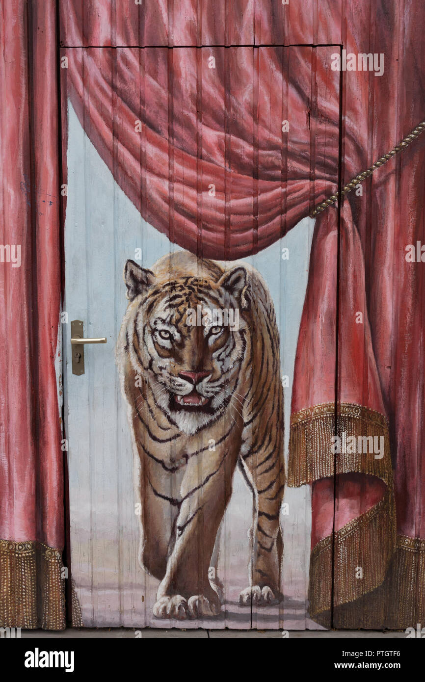 Painted Tiger on a winegrower's gate Stock Photo - Alamy