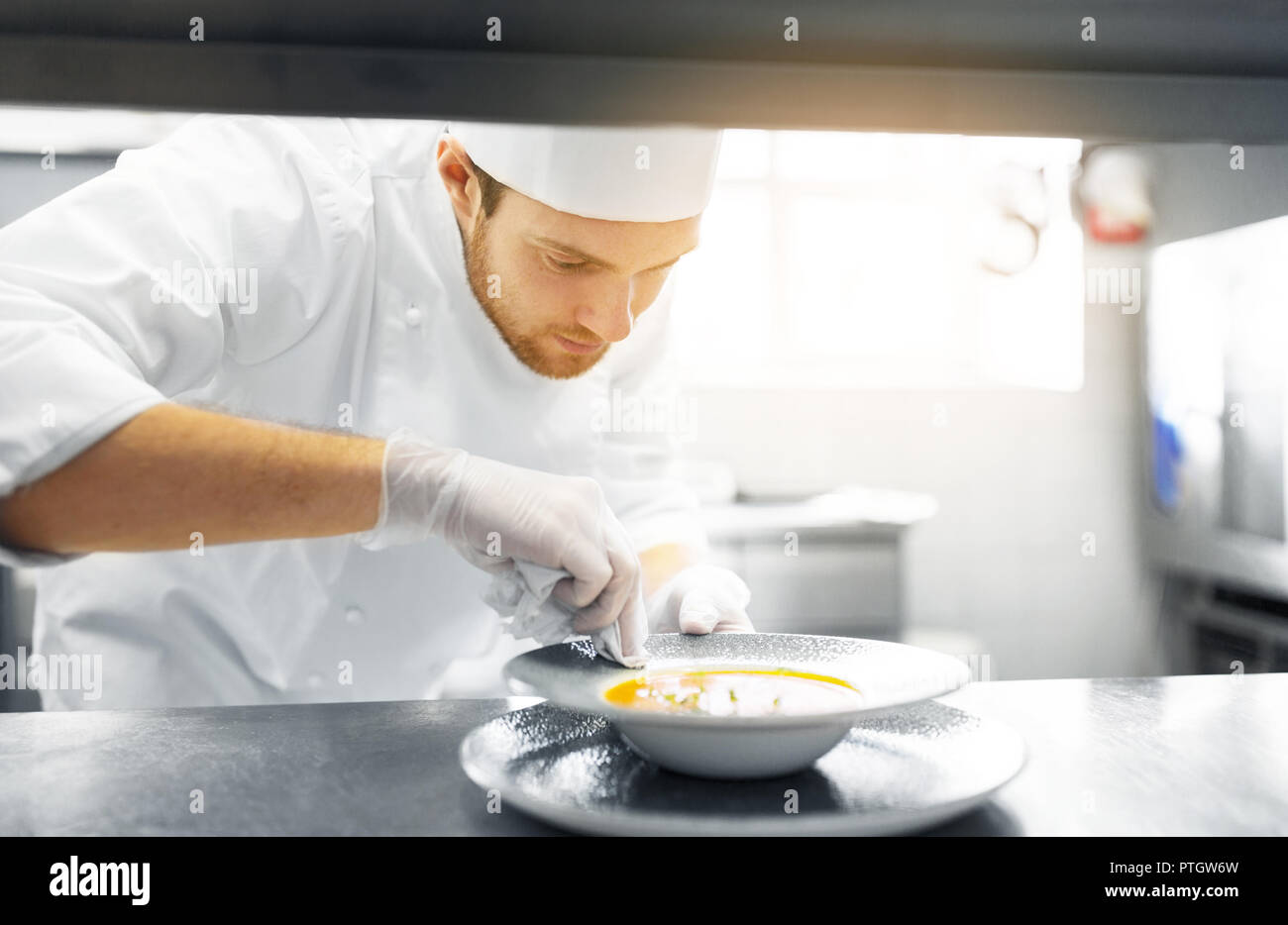 happy male chef cooking food at restaurant kitchen Stock Photo - Alamy