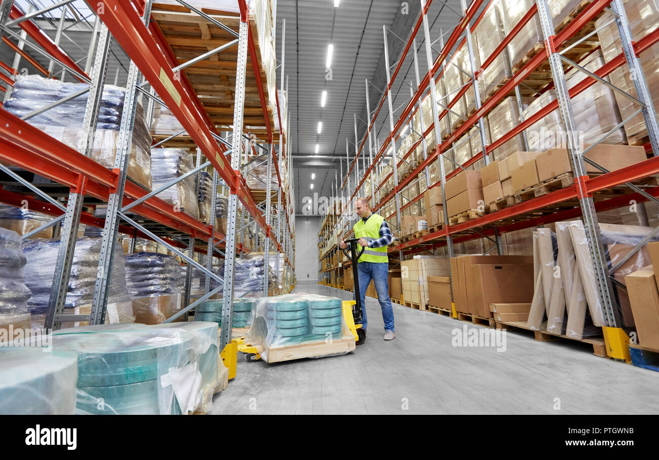 Male loader working in storage hi-res stock photography and images - Alamy