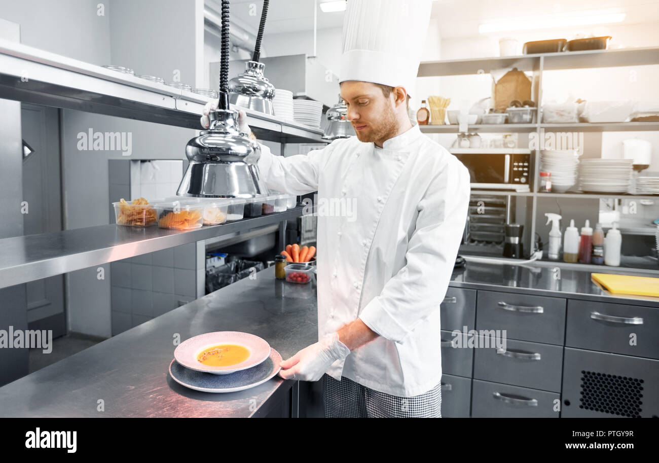 happy male chef cooking food at restaurant kitchen Stock Photo - Alamy