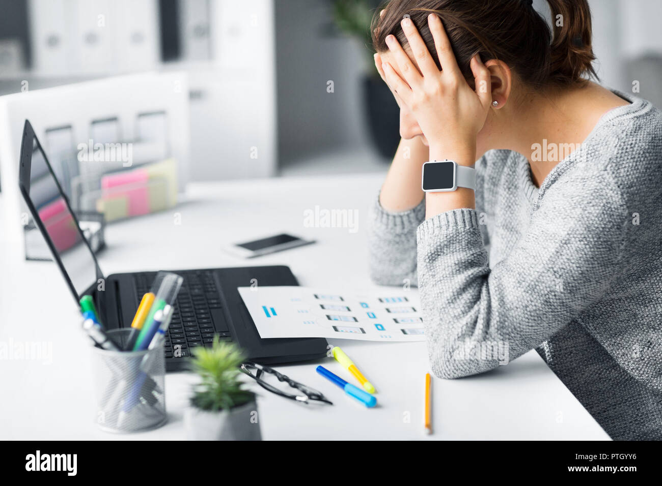 stressed web designer with user interface layout Stock Photo - Alamy