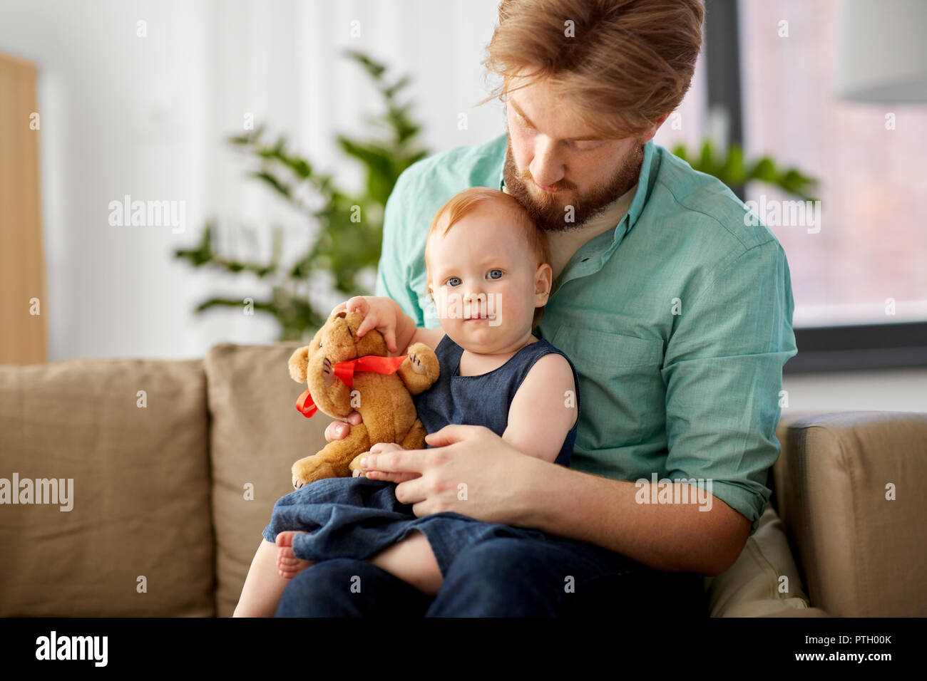 father and baby daughter with teddy bear at home Stock Photo - Alamy