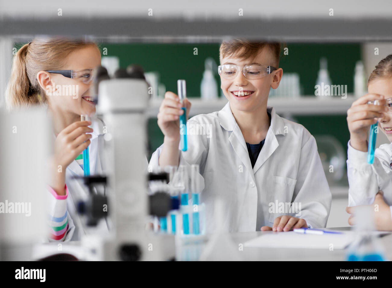 kids with test tubes studying chemistry at school Stock Photo - Alamy