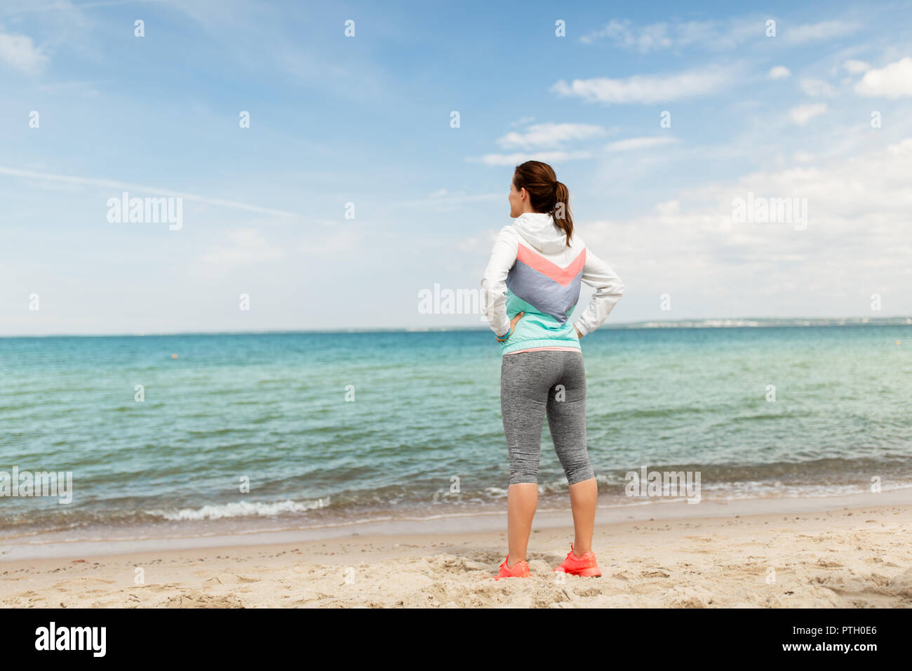 Clothes on beach hi-res stock photography and images - Alamy