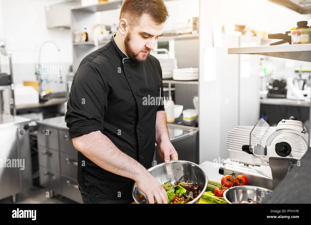 chef cook making food at restaurant kitchen Stock Photo - Alamy