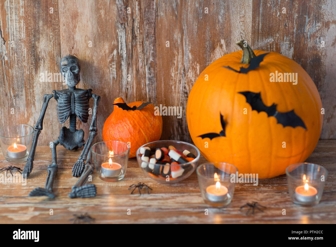halloween pumpkins, skeleton and candies Stock Photo - Alamy